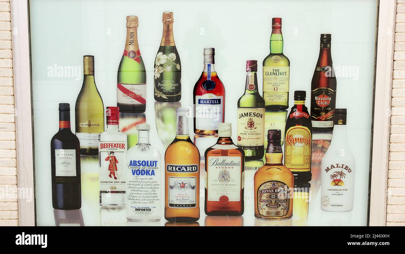 Exhibition of alcoholic beverages in a shop window in Barcelona ...