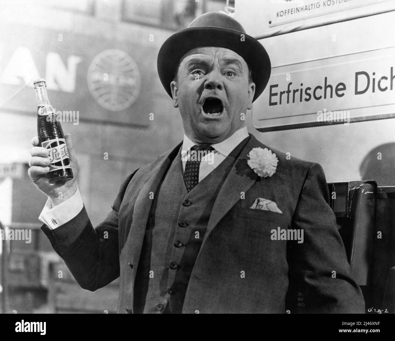 JAMES CAGNEY as Coca-Cola Executive C.R. MacNamara holding Pepsi-Cola ...