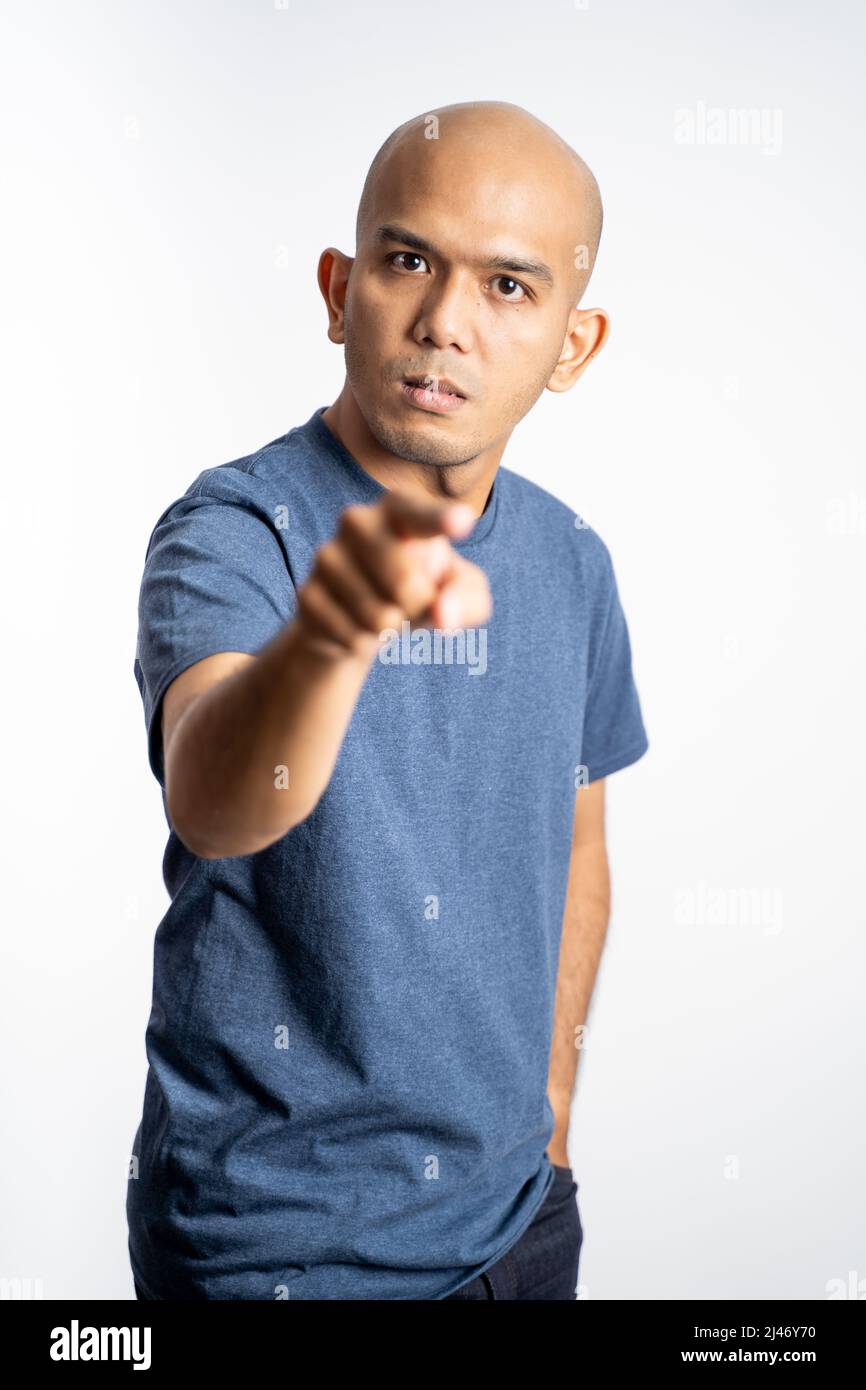 angry bald man with finger pointing forward Stock Photo - Alamy