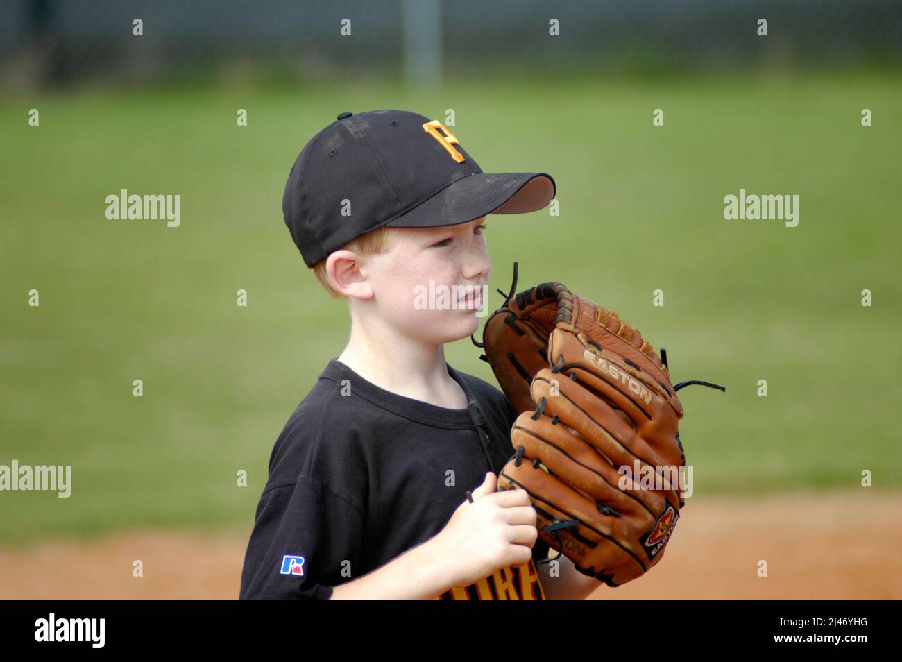 Young boys playing baseball on ball field, Pitcher, Catcher, Hitter and ...