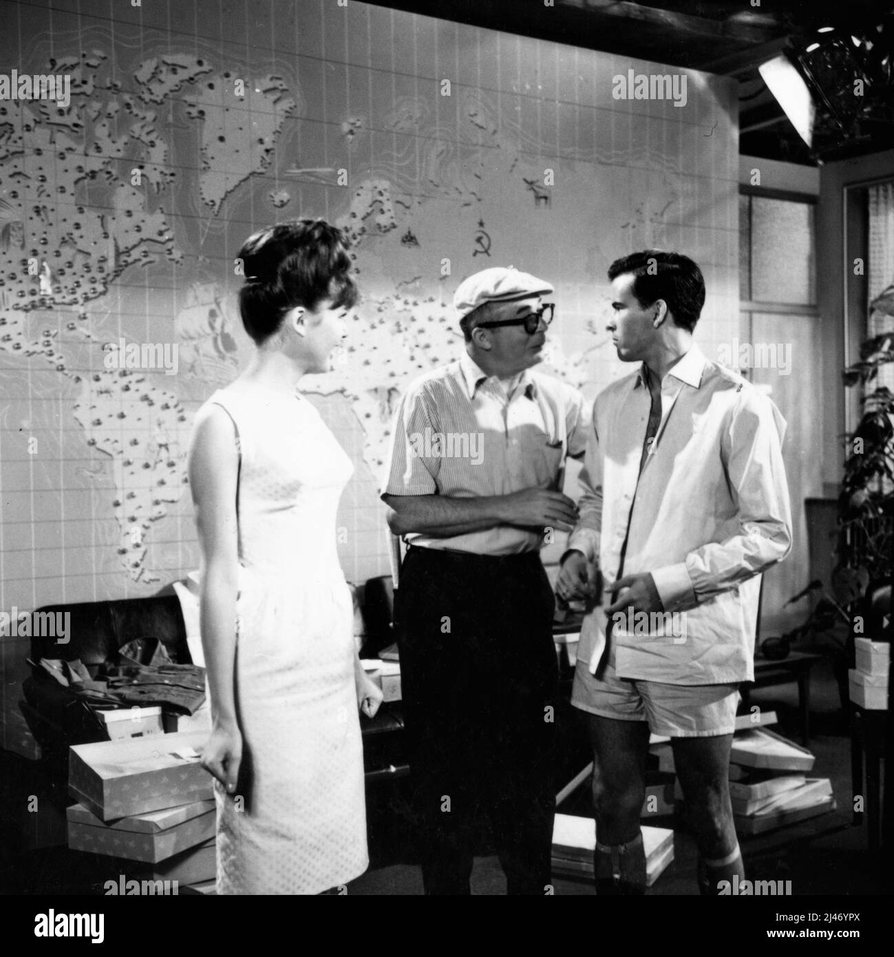 PAMELA TIFFIN Director BILLY WILDER and HORST BUCHHOLZ on set candid during filming of ONE, TWO ...