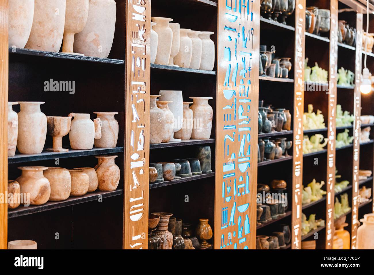 11 January 2022, Luxor, Egypt: Souvenir shop shelves with various goods ...