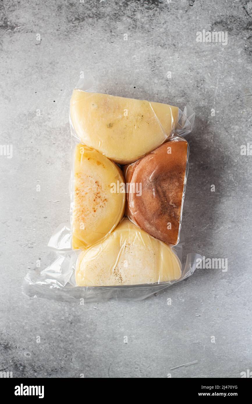 Assorted cheese in a vacuum packaging. Top view Stock Photo - Alamy