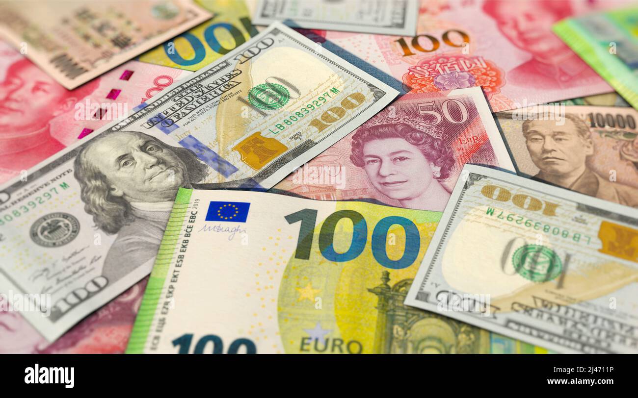 Different currencies - US dollar, Euro, Pound sterling, Yen and Yuan ...