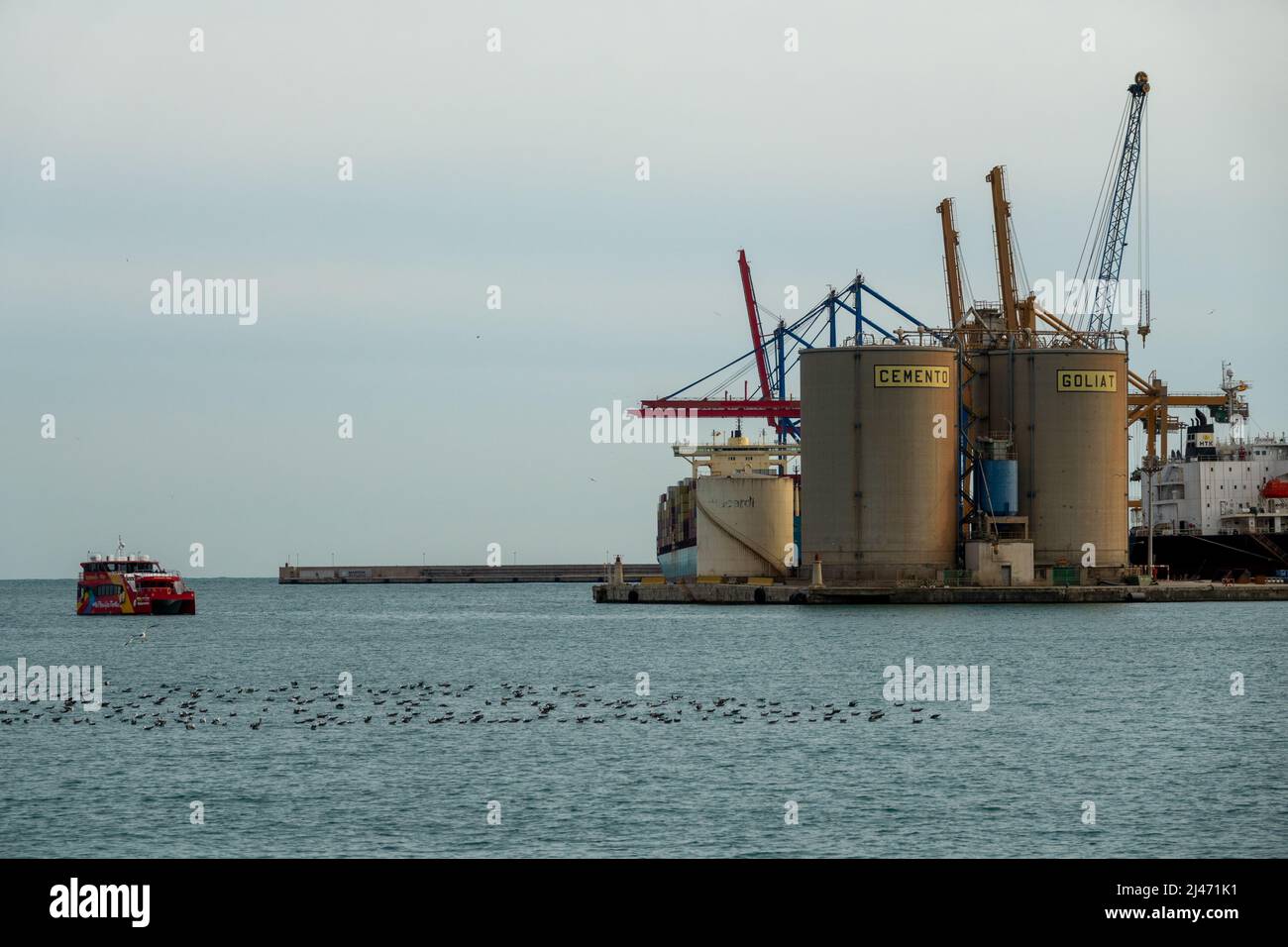 Málaga, Spain: April-02, 2022: container cargo freight ship and cranes ...