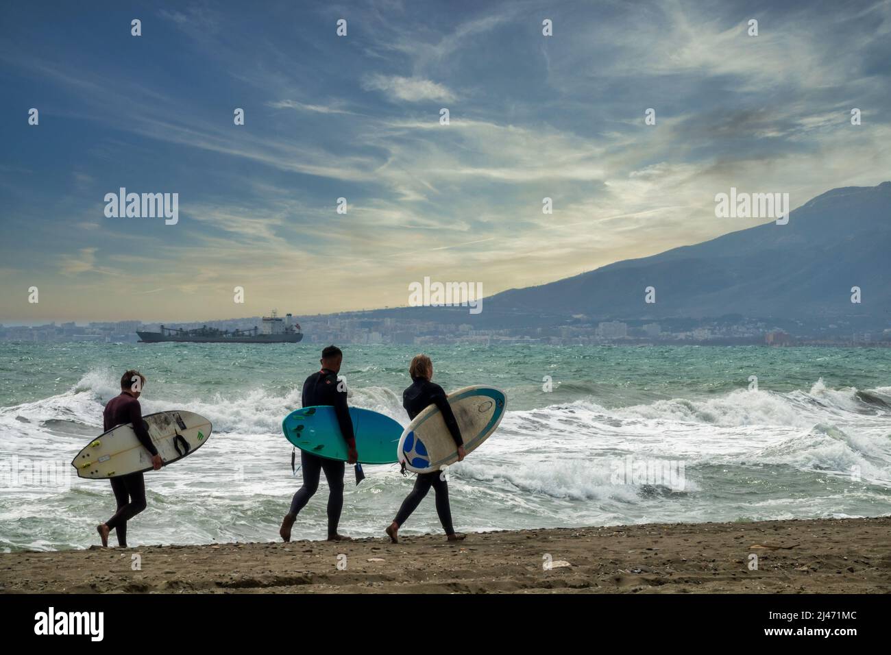 Three boy surfers hi-res stock photography and images - Alamy