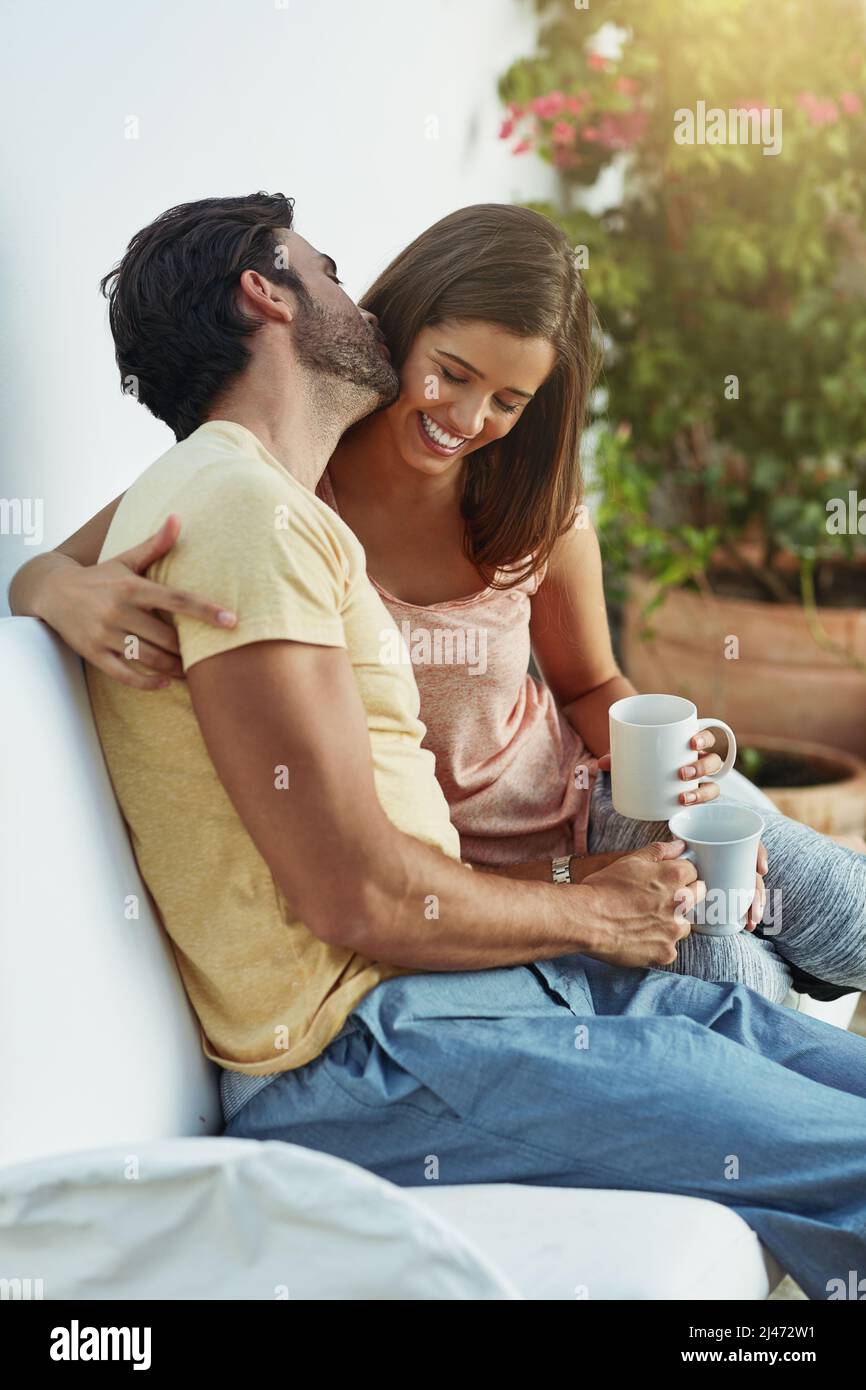 Man whispering in woman ear hi-res stock photography and images - Alamy