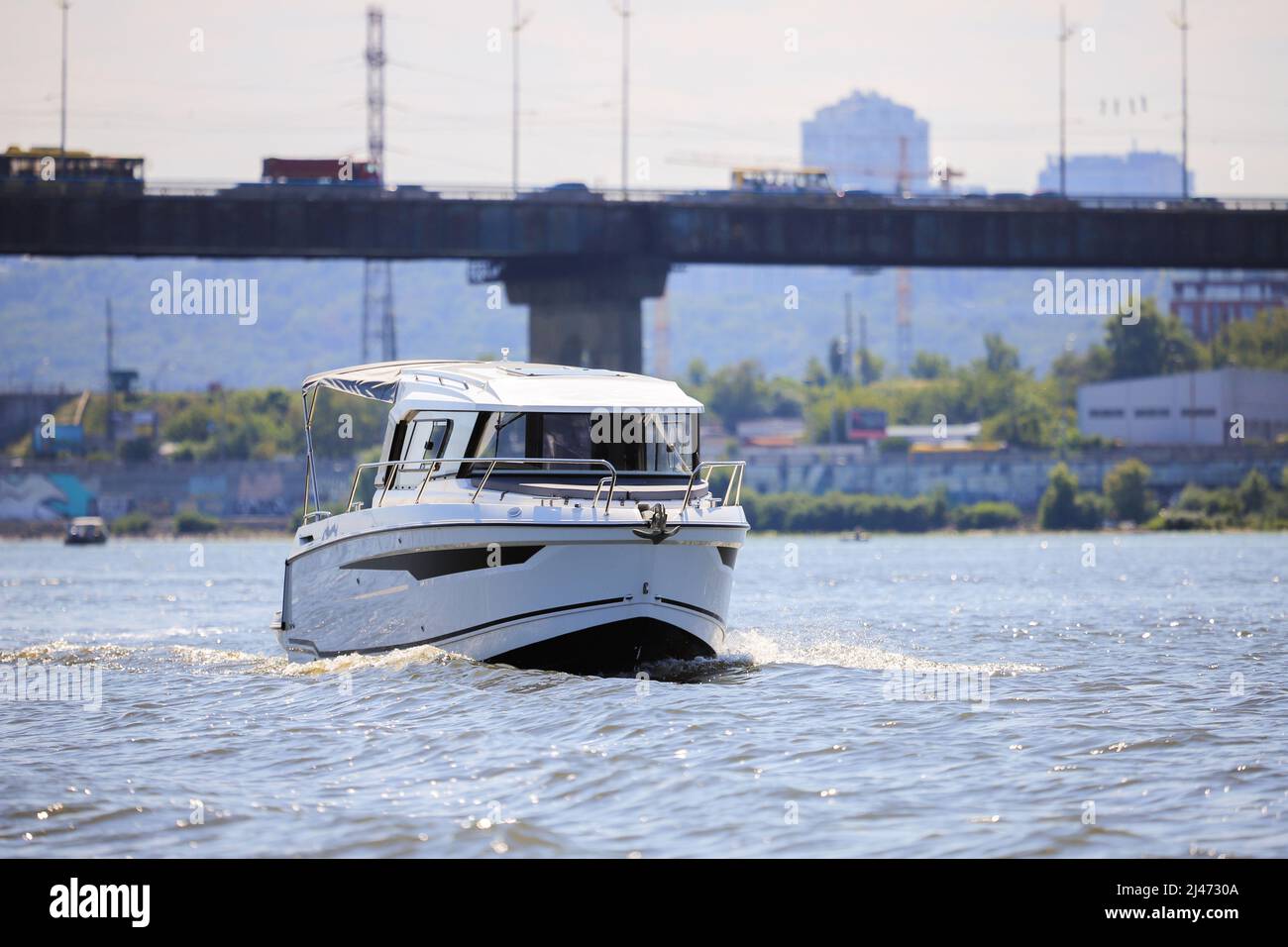 Luxury motorboat floating on the river Stock Photo - Alamy