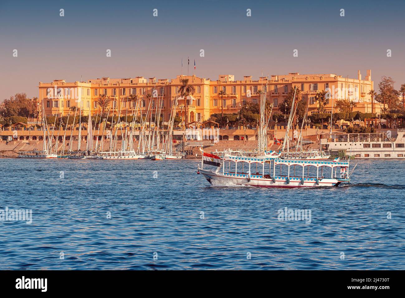 Traditional Egyptian ferry motorboat carry passengers from one bank of ...