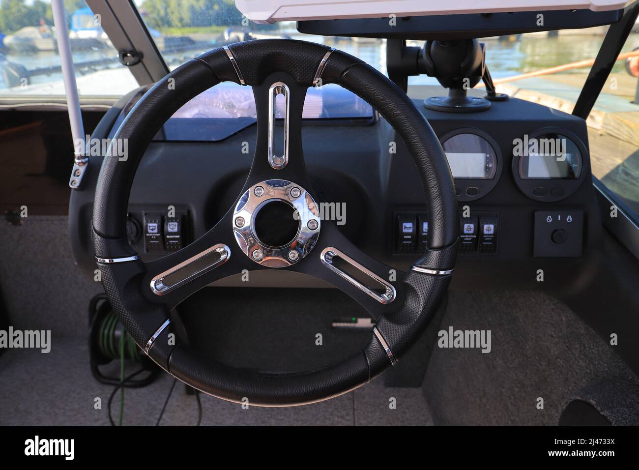 Motor boat steering wheel and dashboard with navigation devices Stock ...
