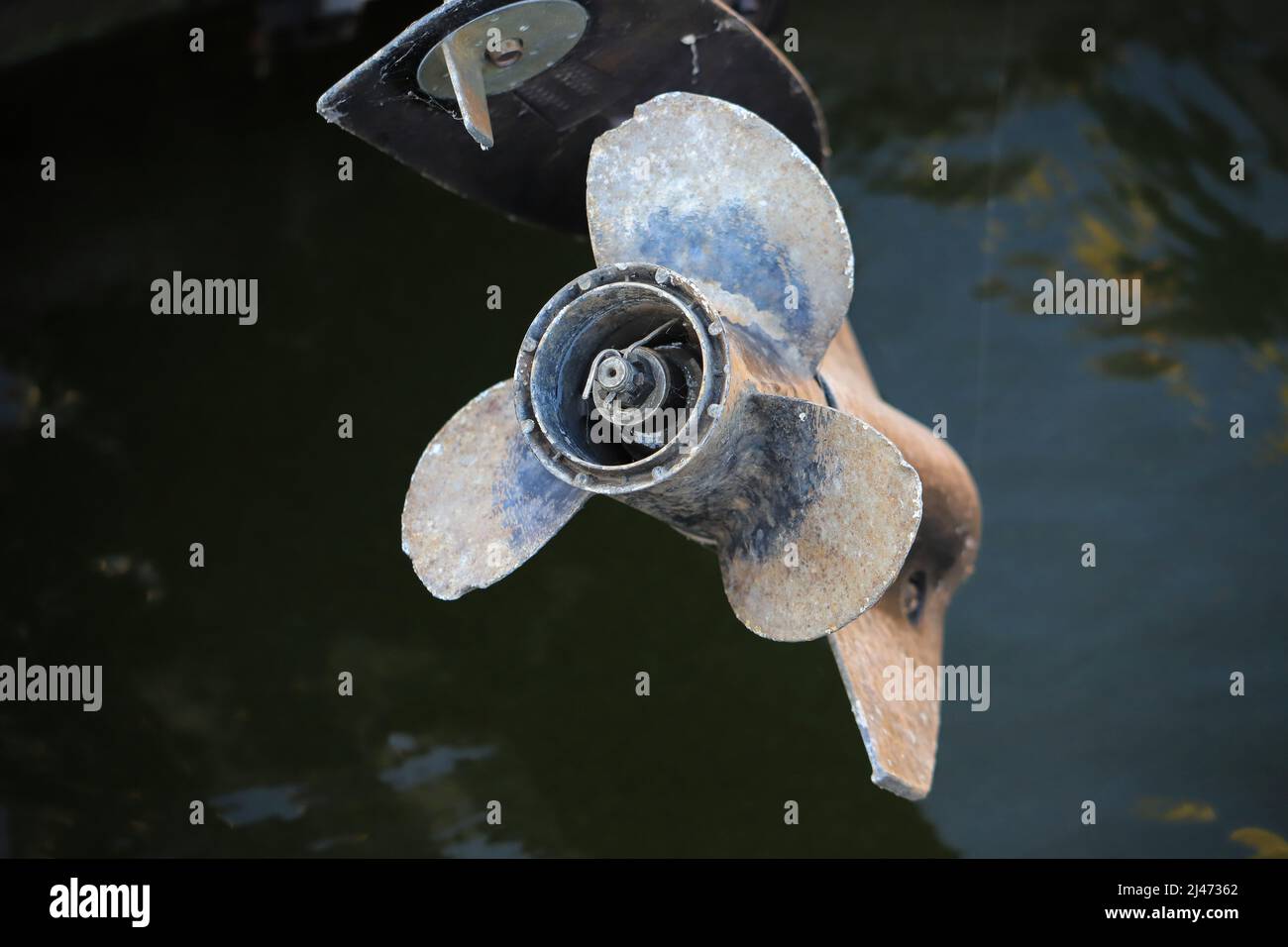 Old screw motor boat on the motor engine Stock Photo - Alamy
