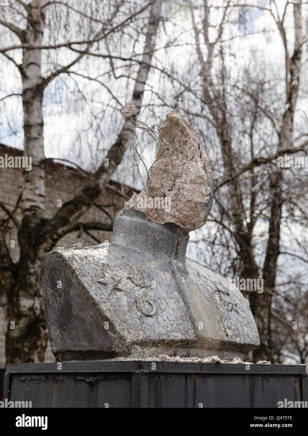 ANDRIIVKA, UKRAINE - Apr. 12, 2022: Damaged monument to the hero of the ...
