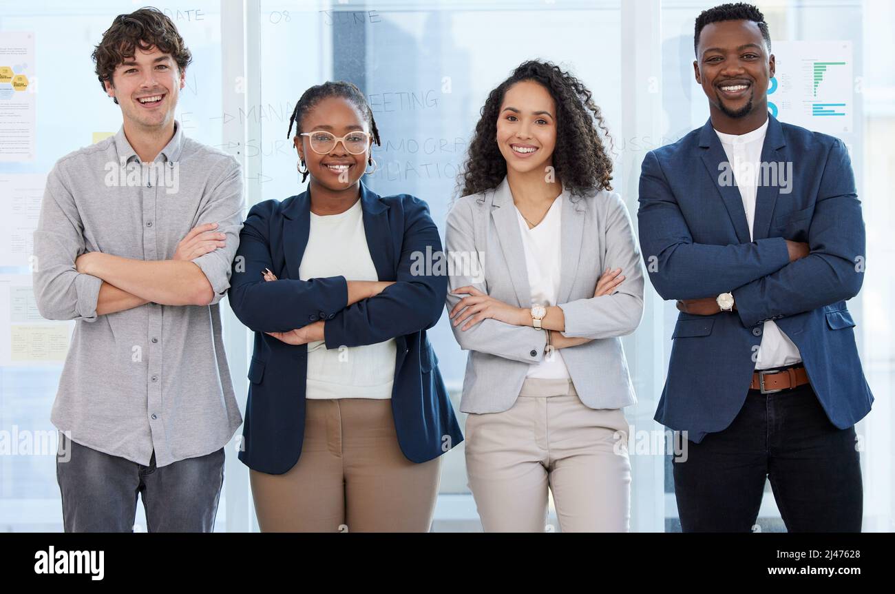 Confidence leads us through the day. Portrait of a group of confident ...