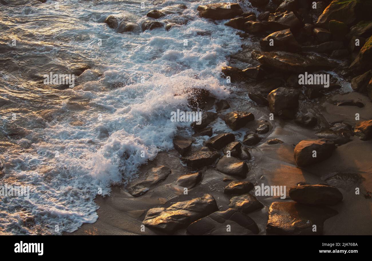 Sea waves and rock on the beach. Beautiful seascape nature. Travel and ...
