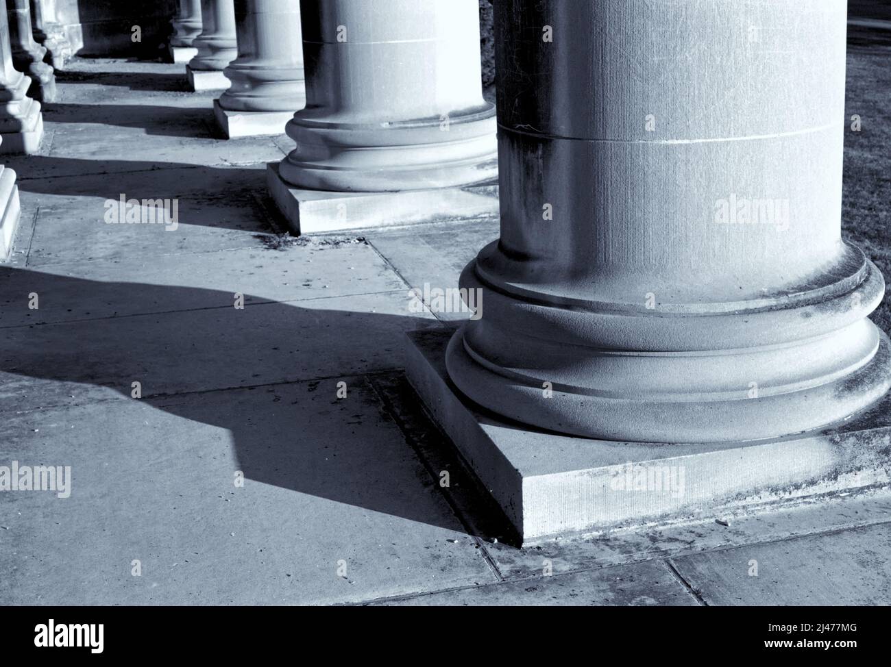 Classical stone pillars detail on the facade of a building Stock Photo ...