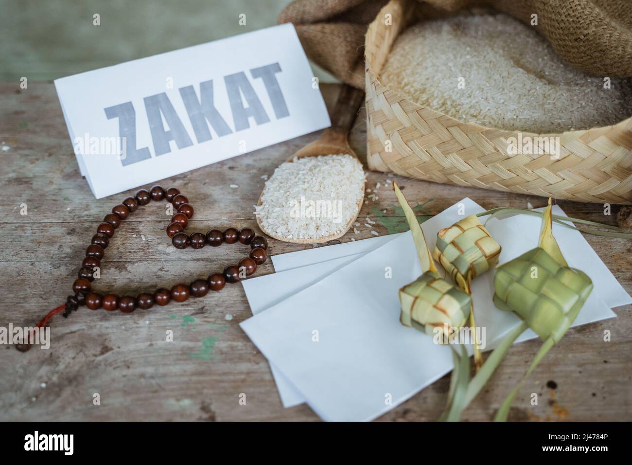 Muslim concept for zakat payment on the table Stock Photo - Alamy