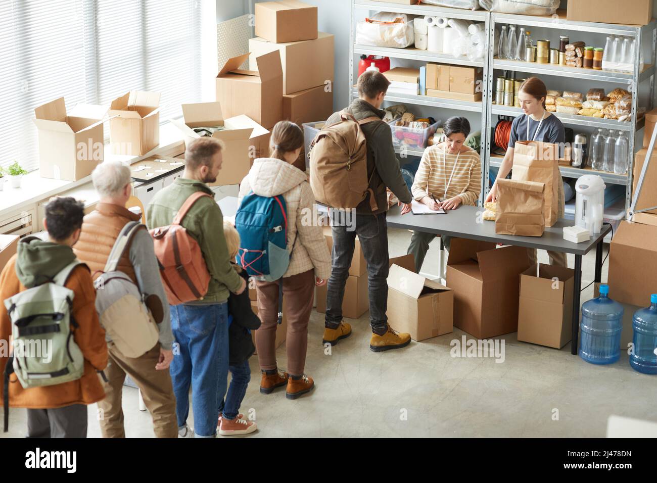 Homeless waiting line soup kitchen hi-res stock photography and images ...