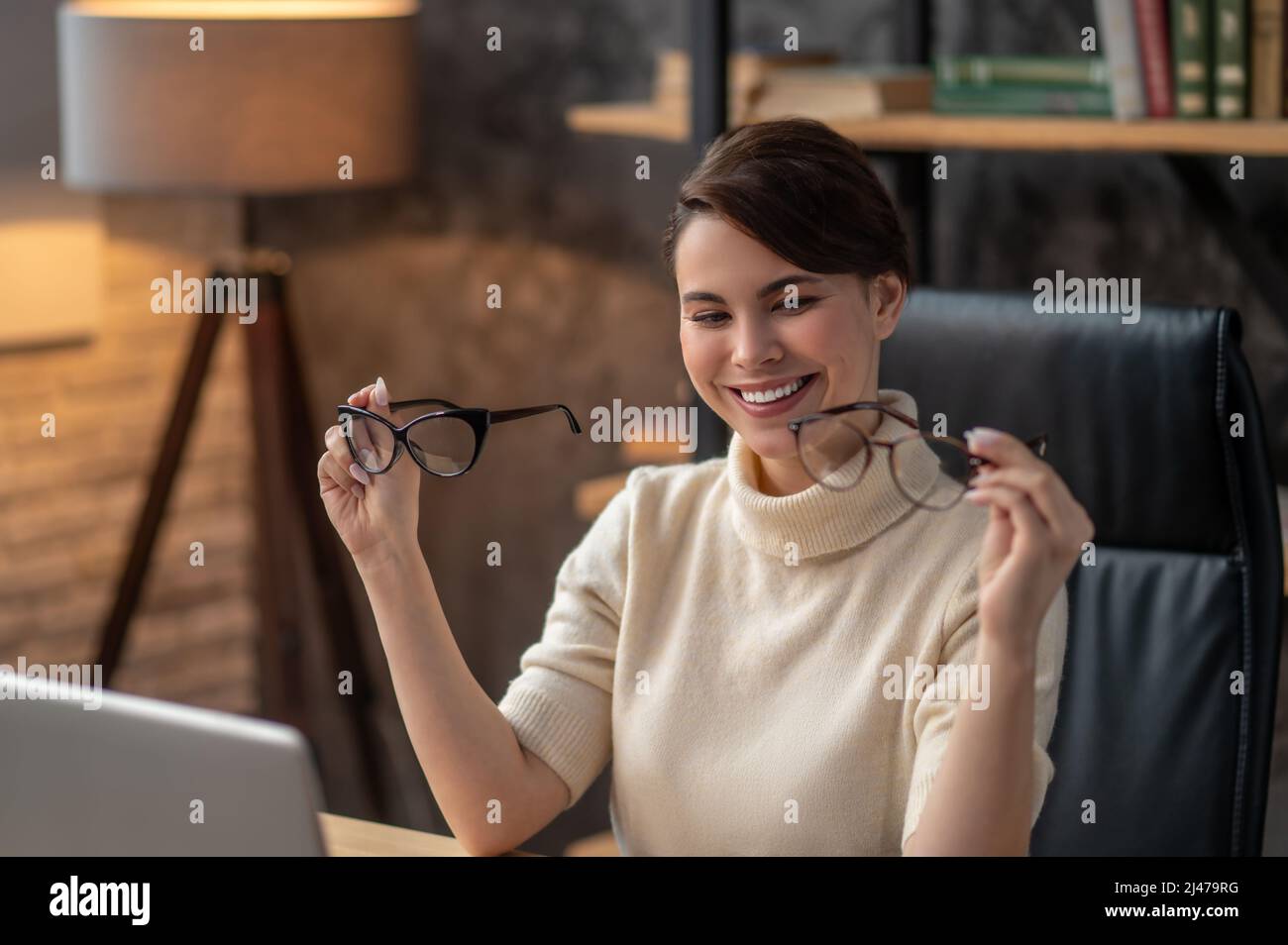 Two pairs of eyeglasses hi-res stock photography and images - Alamy