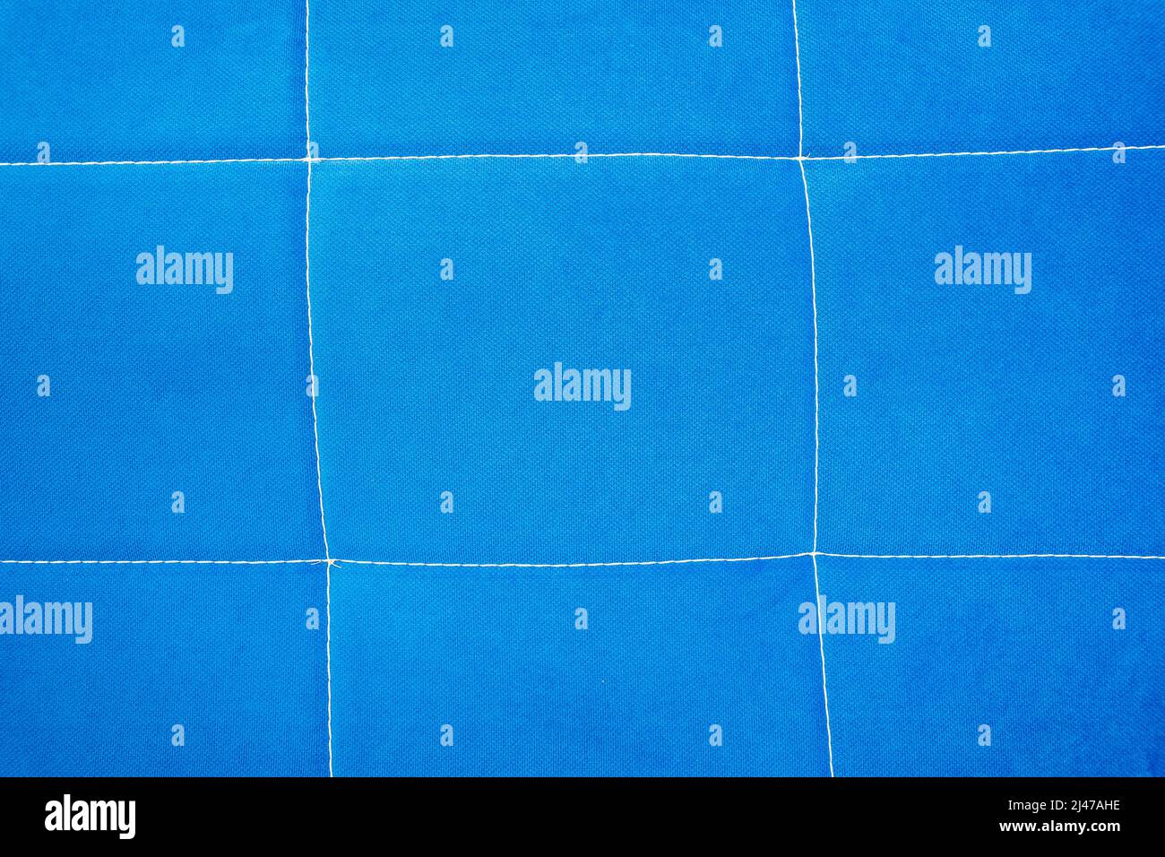 blue fabric backgroundbackground of blue fabric with stitching Stock ...