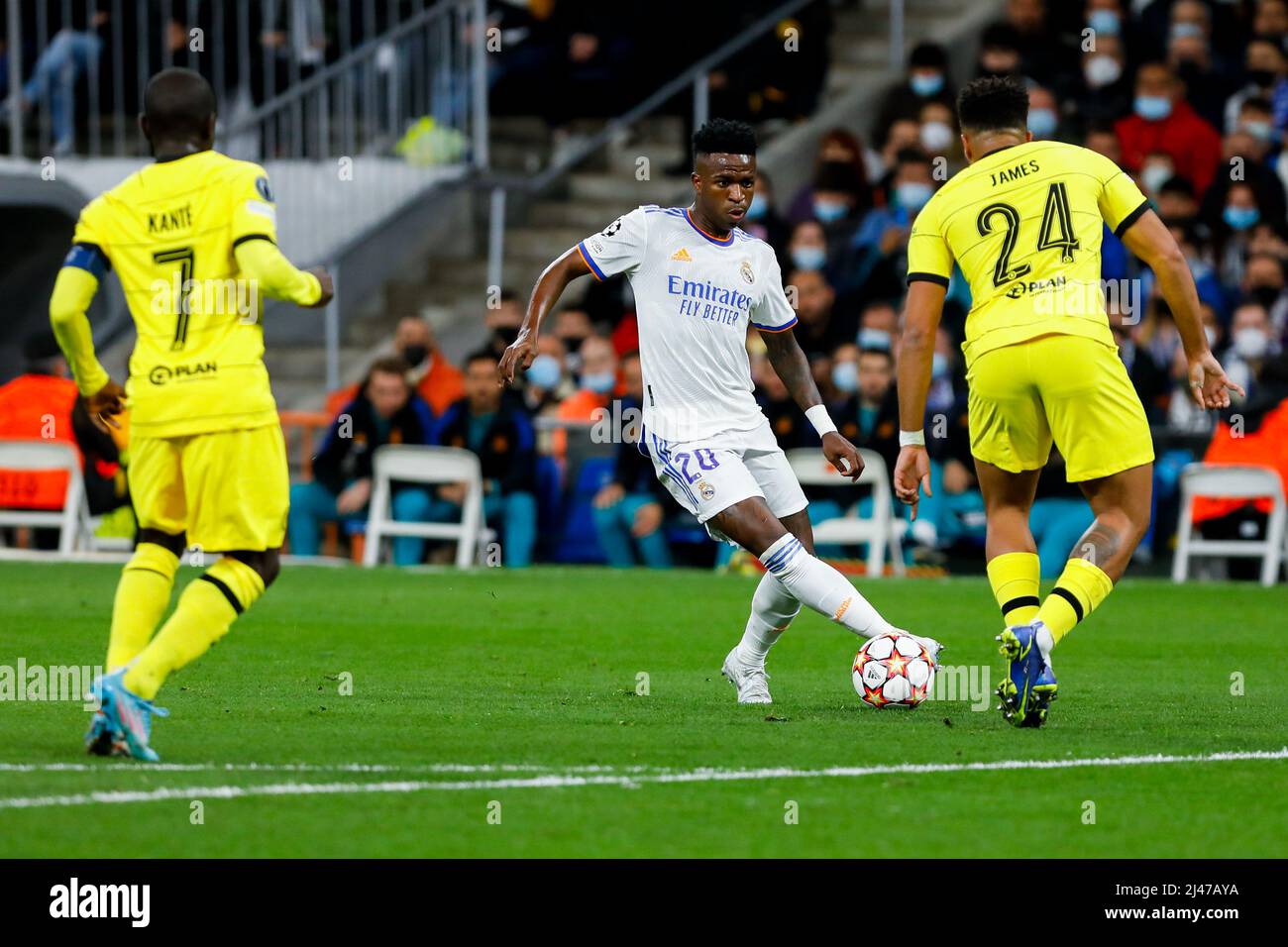 MADRID, SPAIN - APRIL 12: Vinicius Junior of Real Madrid in duel with Reece James of Chelsea FC ...
