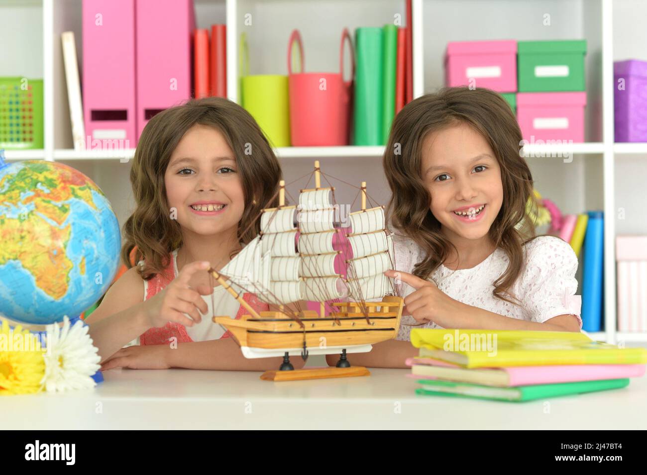 portrait of cute girls on lesson Stock Photo - Alamy