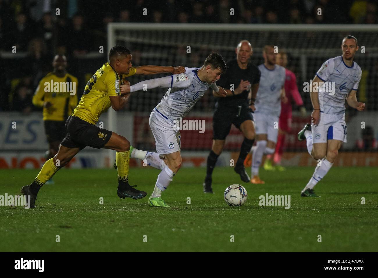 Callum Lang #19 of Wigan Athletic runs with the ball Stock Photo - Alamy
