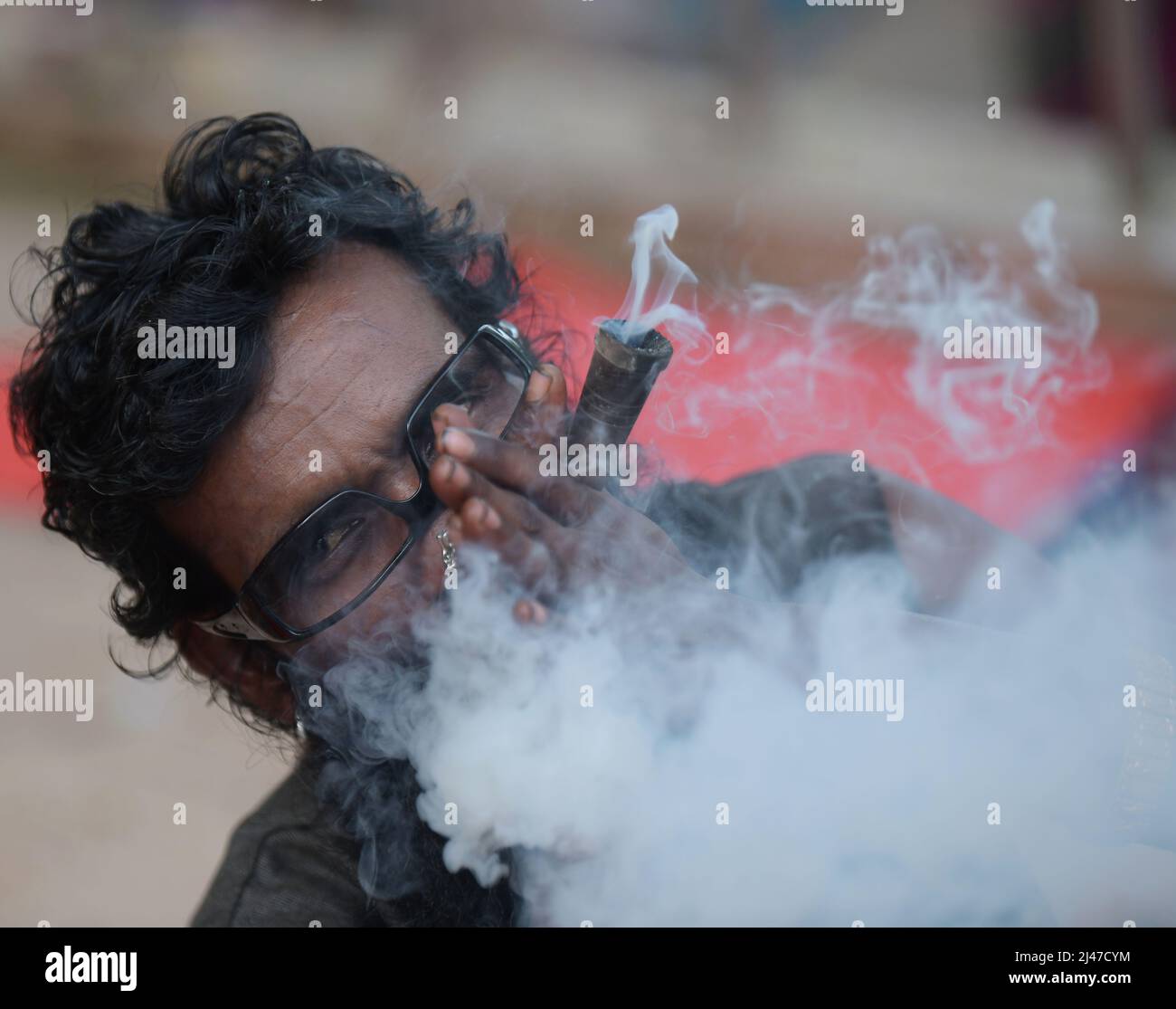 The Sadhus (Holy Men) smoke ganja (Cannabis) at a temple during Brahma ...