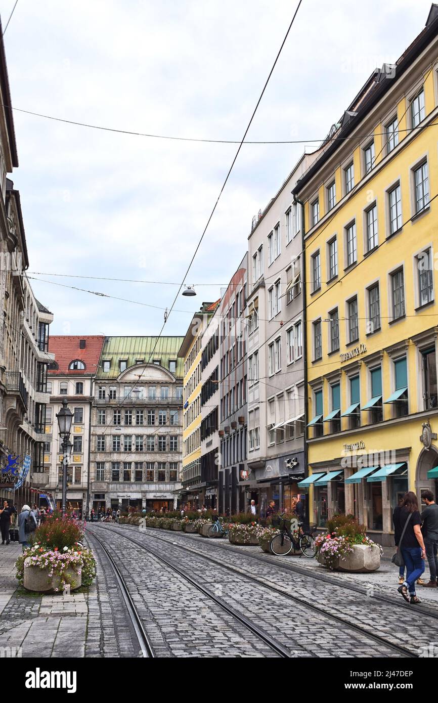Street view of Munich city center with buildings and shops, Bavaria ...