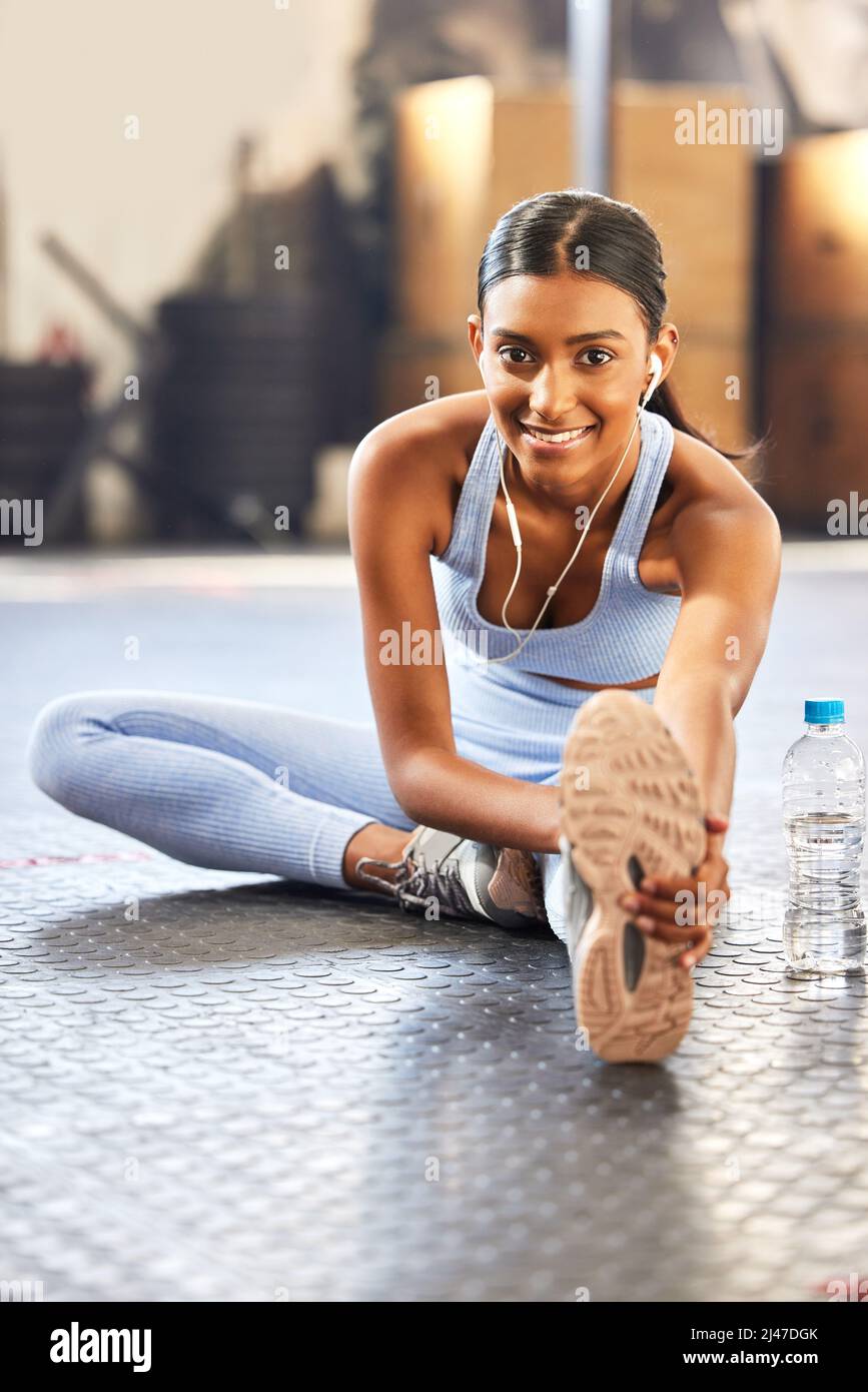 My body feels ready for any fitness challenge. Portrait of a fit young ...