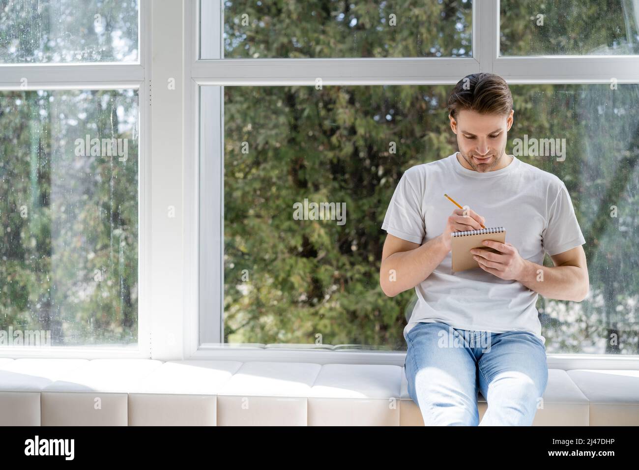 Blue denim jeans with writing hi-res stock photography and images - Alamy