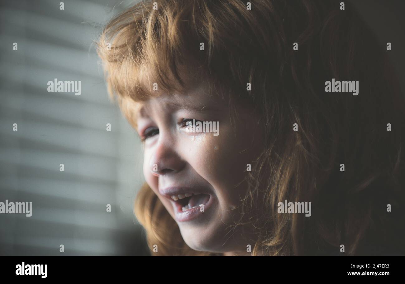 Crying Little Boy. Sad Child at Home Stock Photo - Alamy