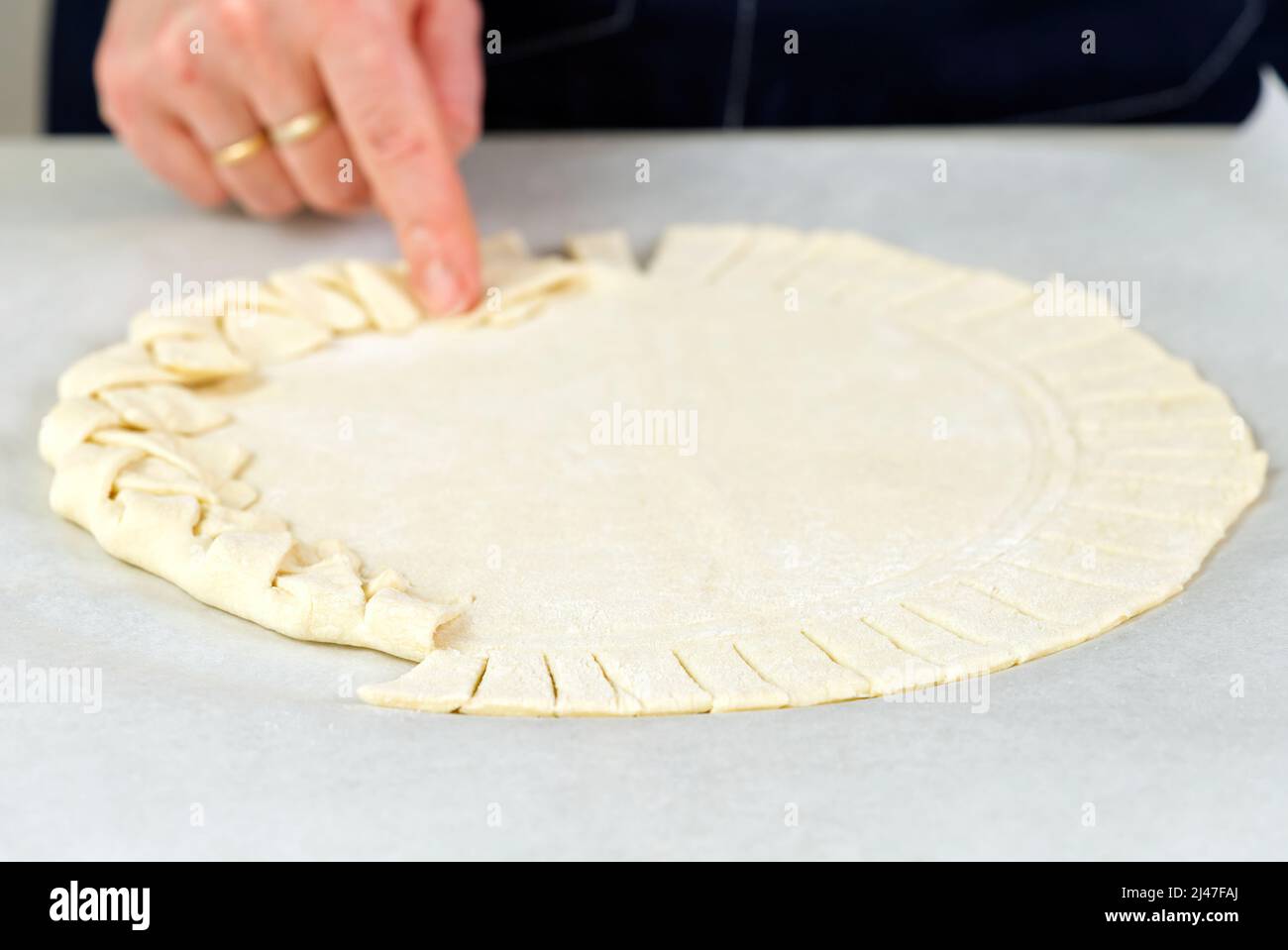 Pizza making process. Top view of pizza dough base. Home-baking pizza ...