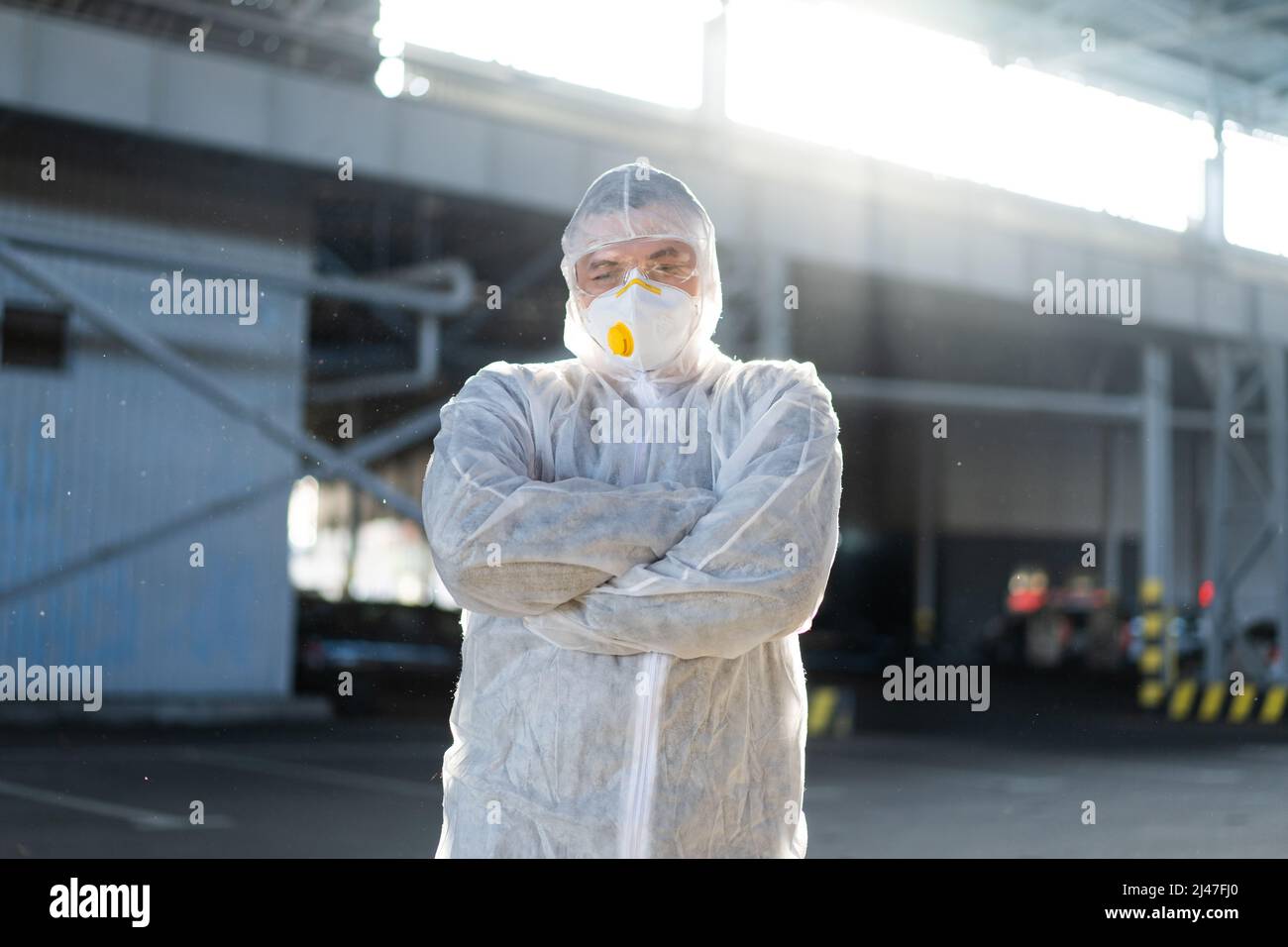 COVID-19 coronavirus doctor standing hospital parking dressed white ...
