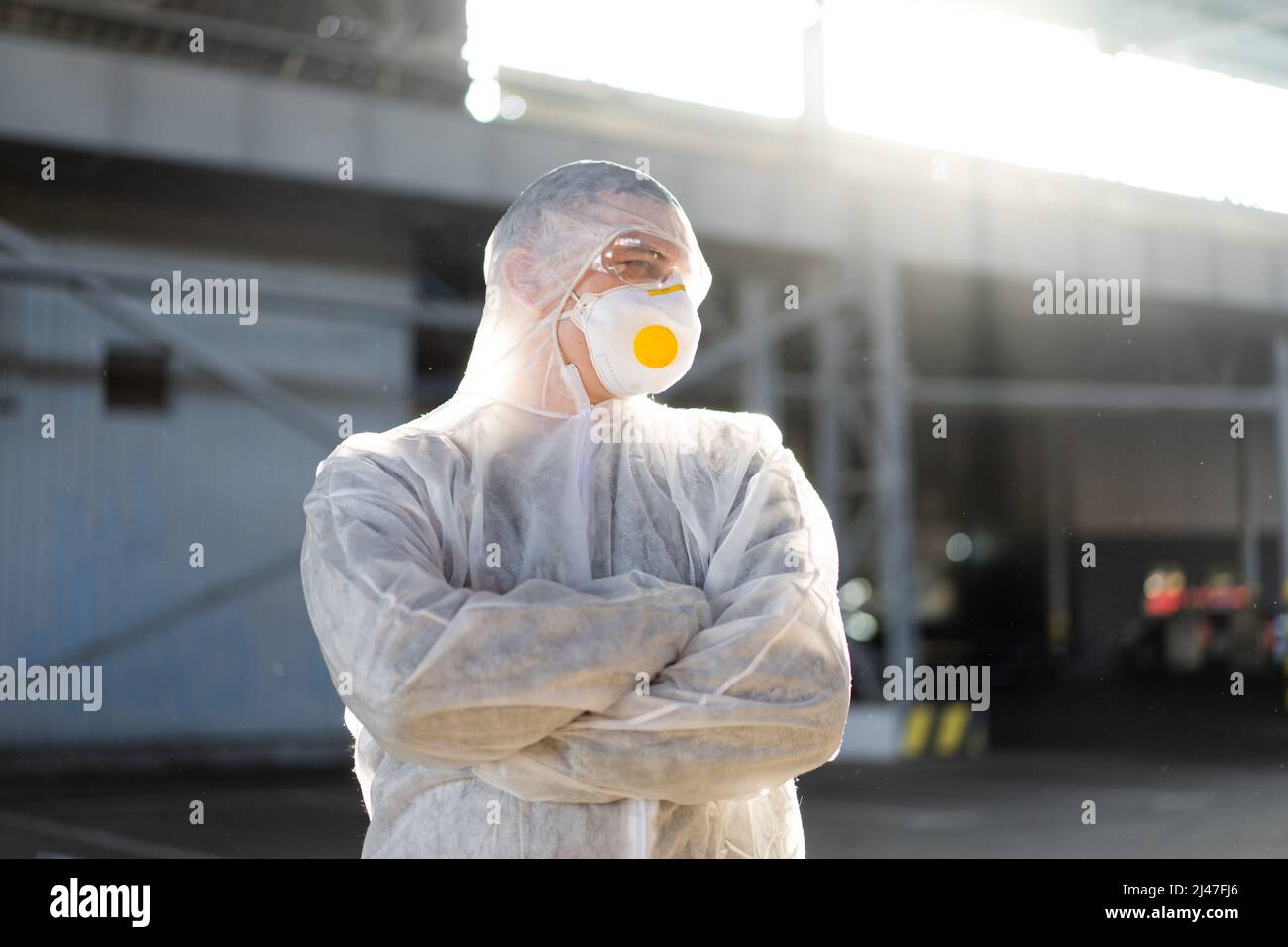 COVID-19 coronavirus doctor standing hospital parking dressed white ...