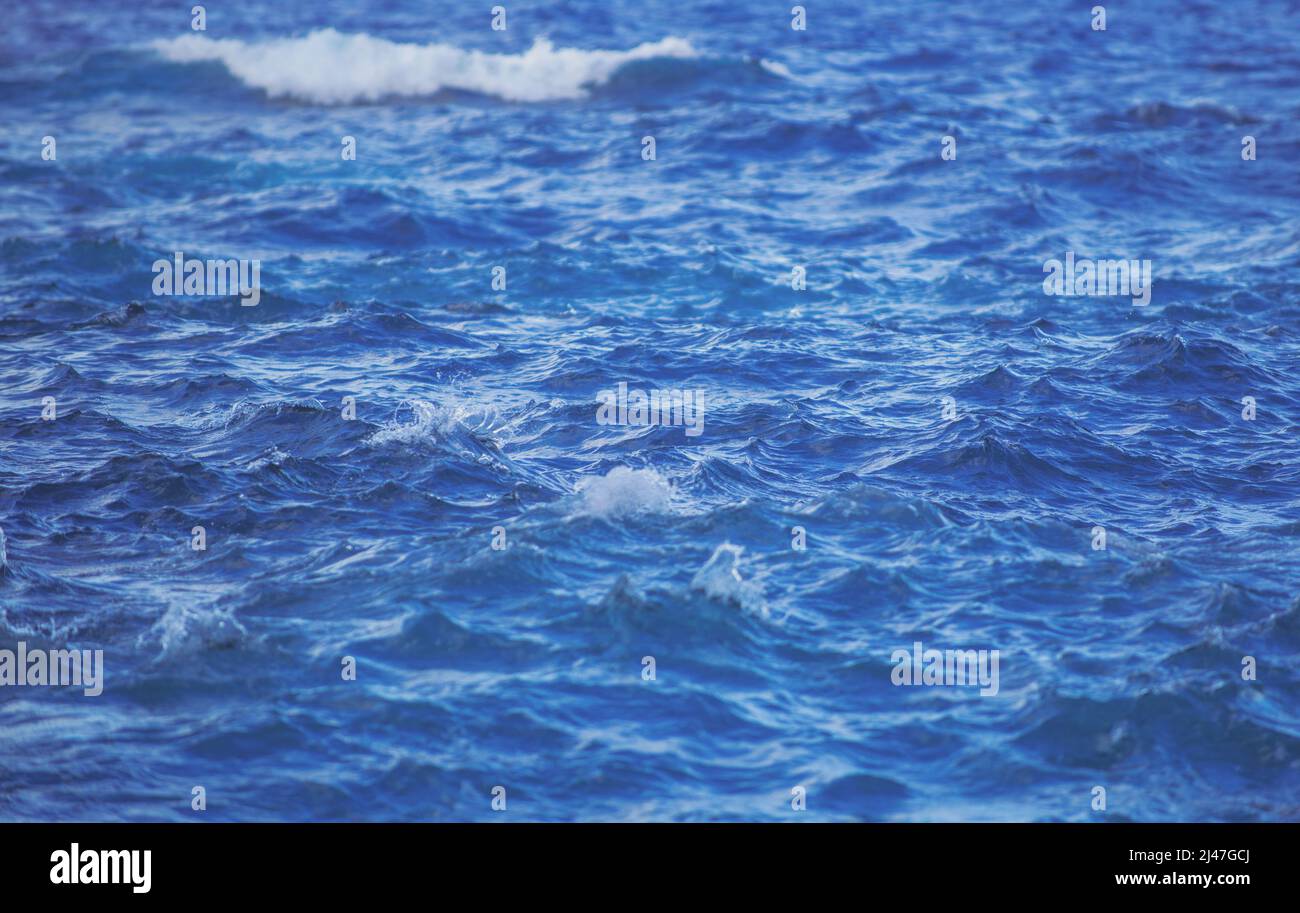 Calm sea water surface texture with splashes and waves. Abstract nature ...