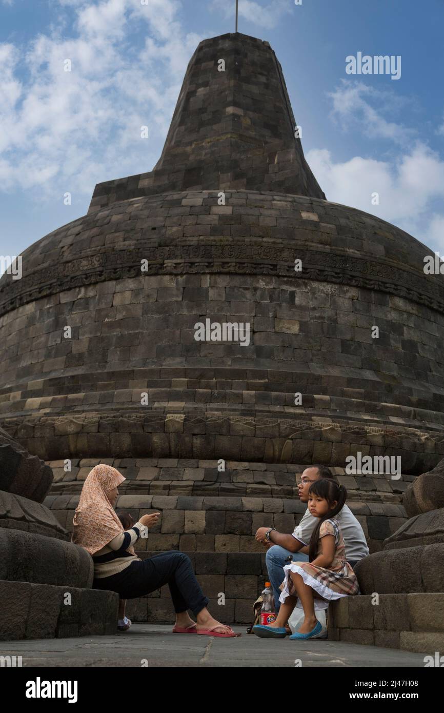 Borobudur, Java, Indonesia. Indonesian Family Resting at the Base of ...