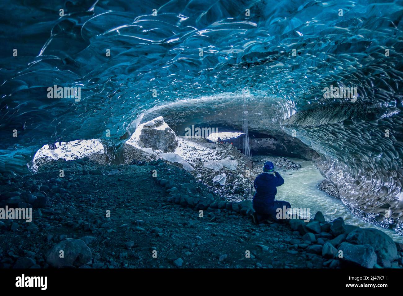 Spectacular blue ice formations inside an ice cave under the ...