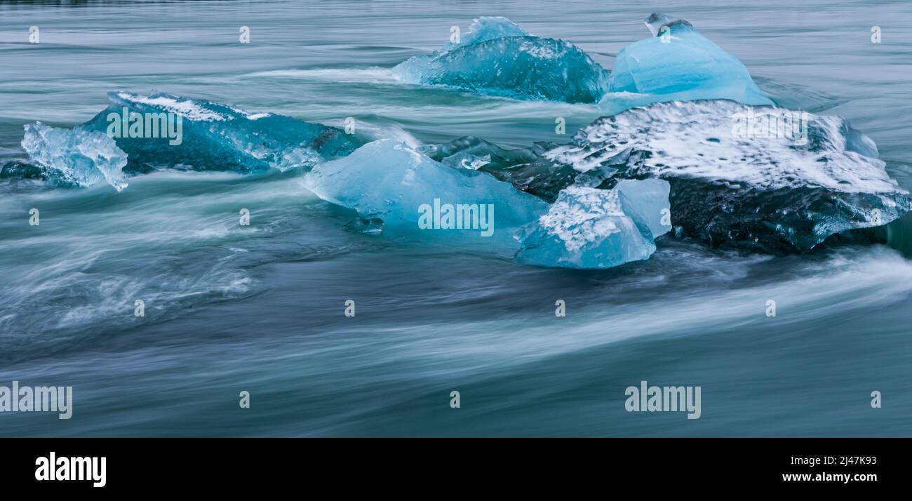Long exposure of icebergs in a glacial melt water lagoon Stock Photo ...