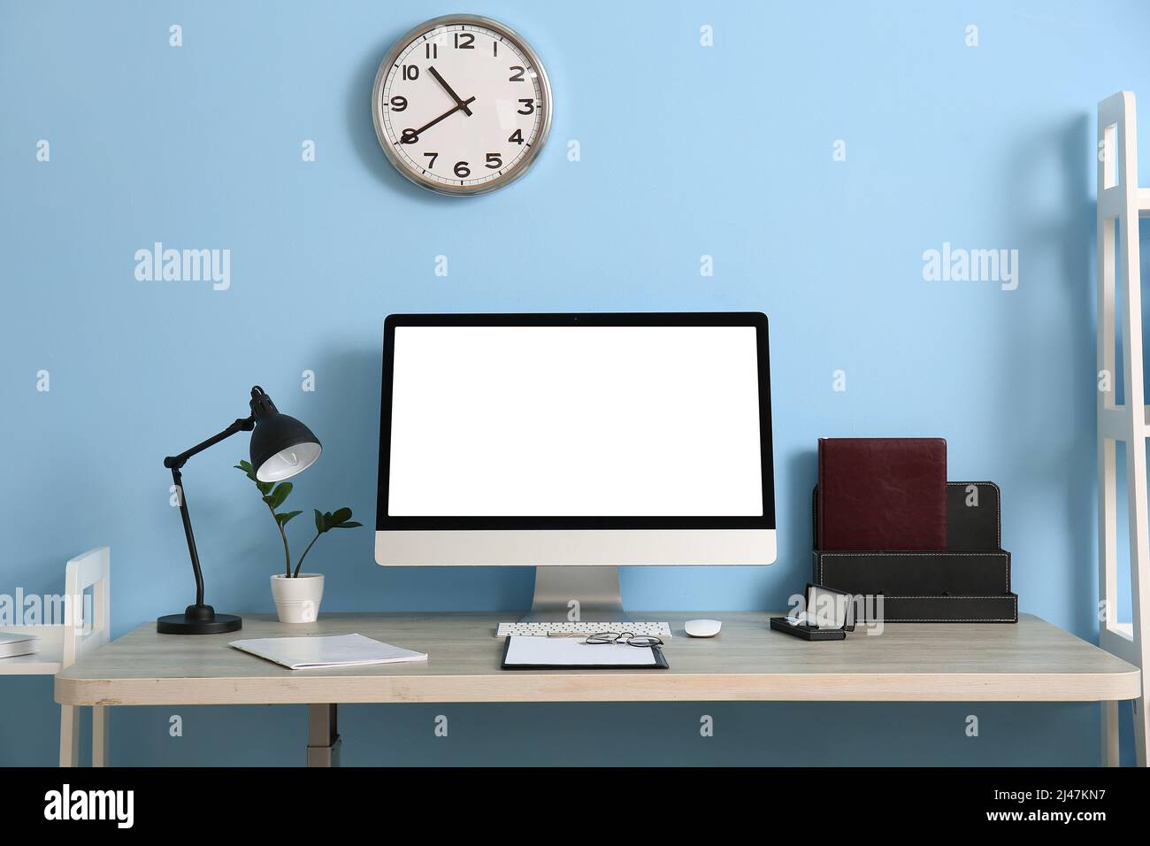 Modern workplace with computer in office Stock Photo - Alamy