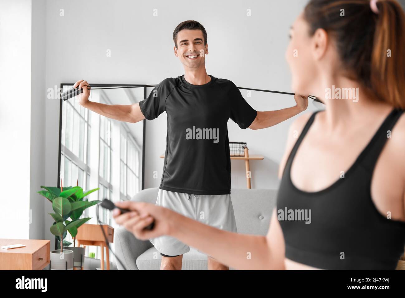 Couple jumping rope hi-res stock photography and images - Alamy
