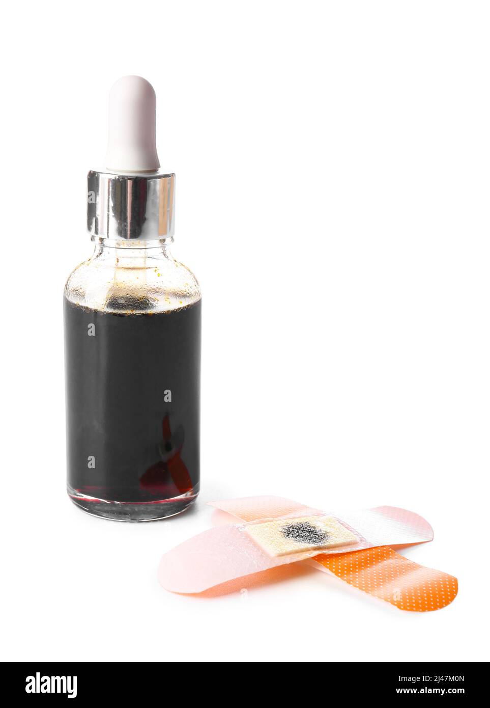 Bottle with iodine and medical plaster on white background Stock Photo ...