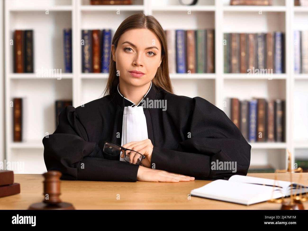 Female judge at workplace in courtroom Stock Photo - Alamy