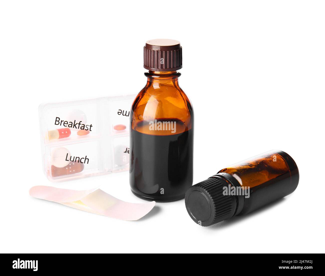 Bottles with iodine, medical plaster and container with pills on white ...