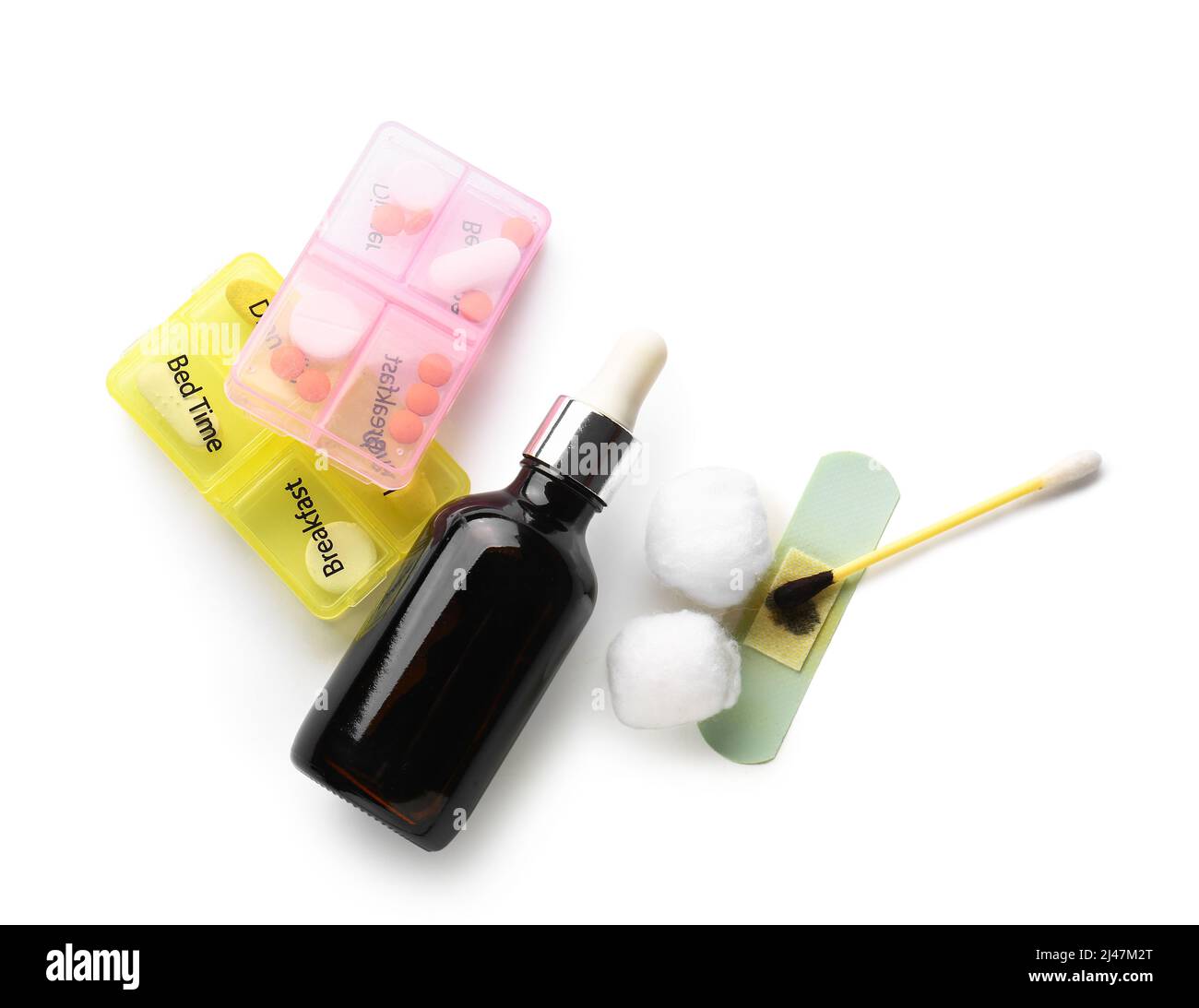Bottle, cotton swab with iodine, plaster and containers with pills on ...