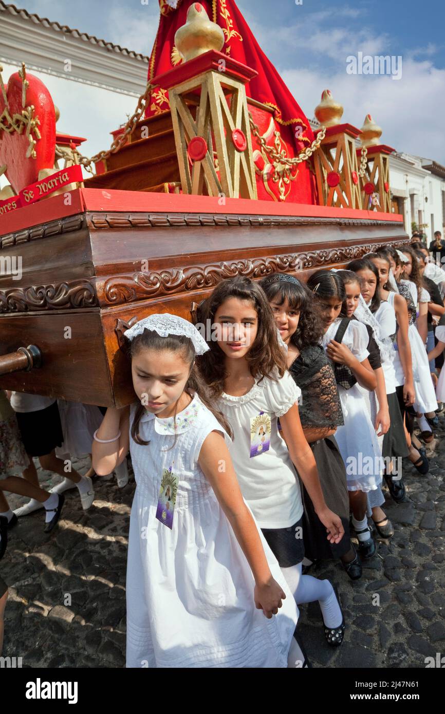 Antigua, Guatemala. Semana Santa (Holy Week). Young Girls Carry an Anda ...