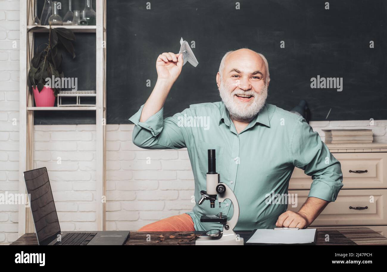 Good teachers enjoy teaching. Teacher preparing for university exams ...