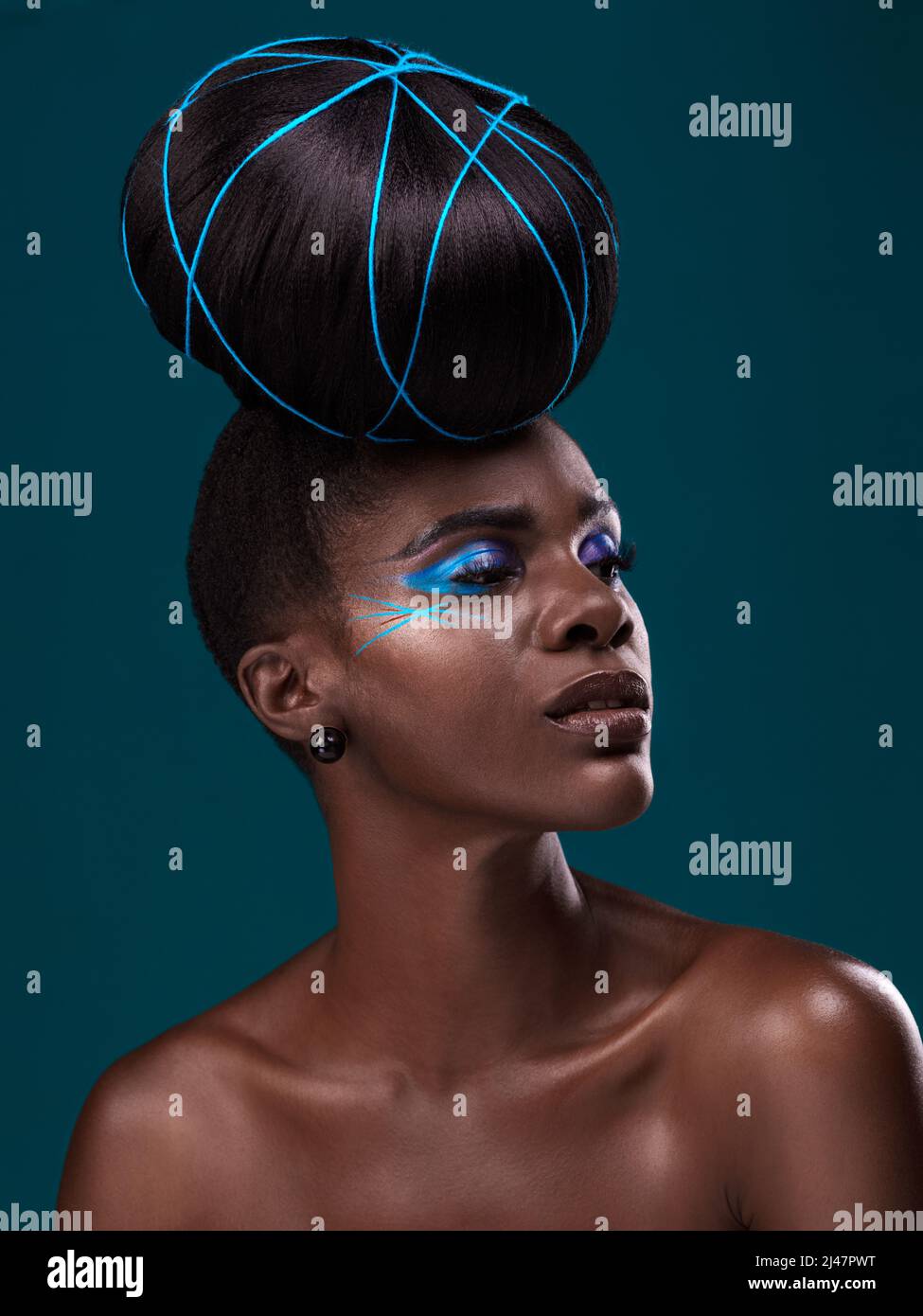 Whats life without colour. Studio shot of a beautiful young woman ...