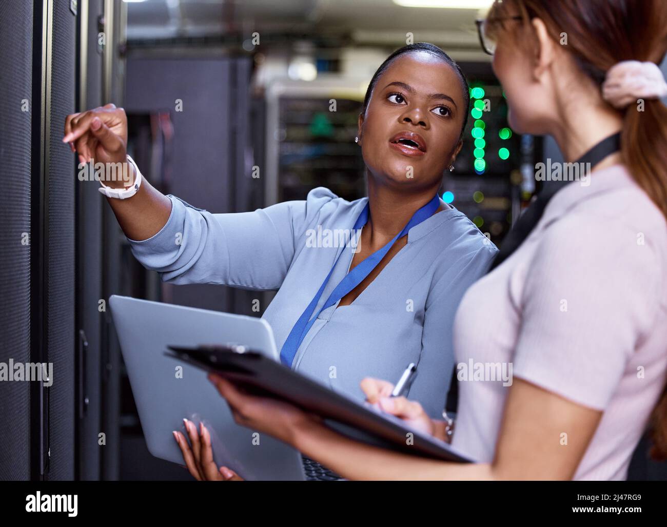 We Need These Servers Running At Optimum Efficiency Cropped Shot Of Two Attractive Young Female