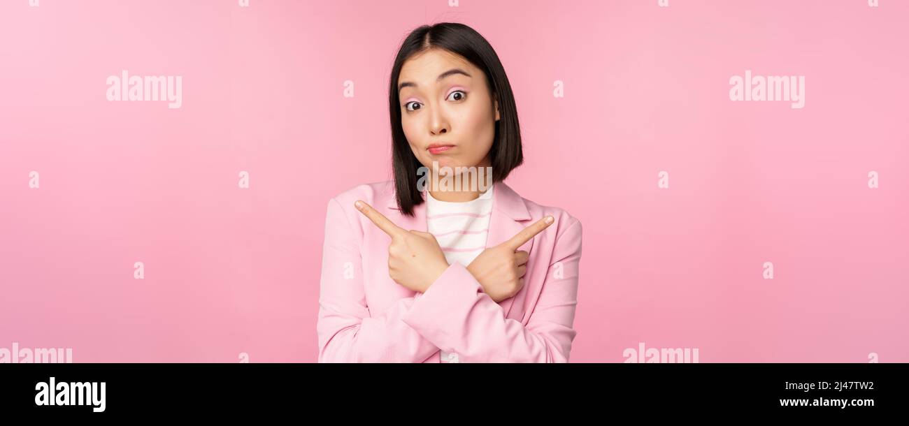 Decision concept. Young asian businesswoman, corporate worker pointing ...