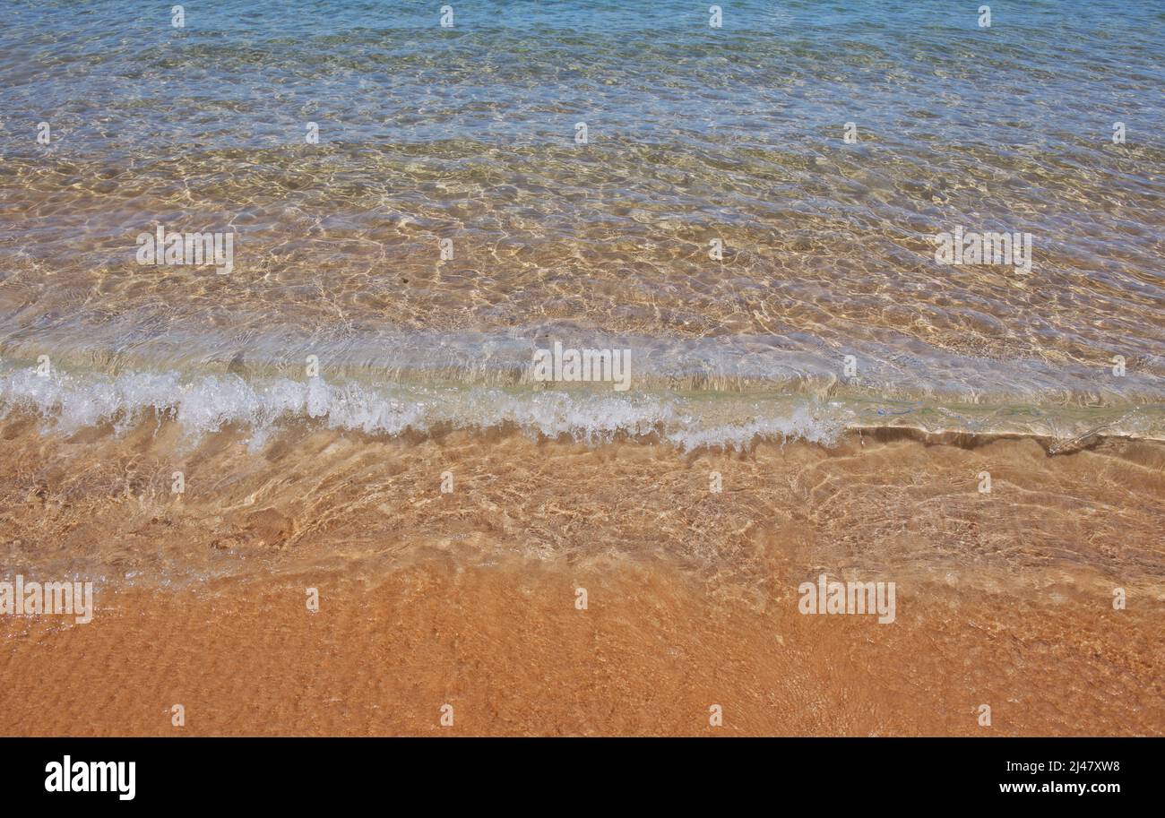 Beach with golden sand, turquoise ocean water. Panoramic sea view ...